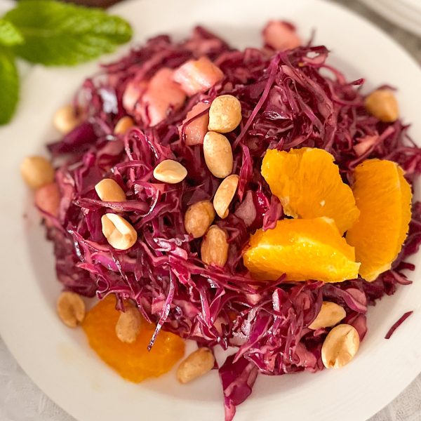 RED CABBAGE SALAD WITH APPLE ORANGE AND PEANUTS - The Tasty Chapter